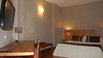 Quarto Individual Standard | Minibar, cofre no quarto, secretária, Wi-fi grátis