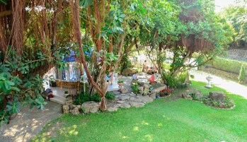Quarto Duplo Deluxe, varanda | Jardim