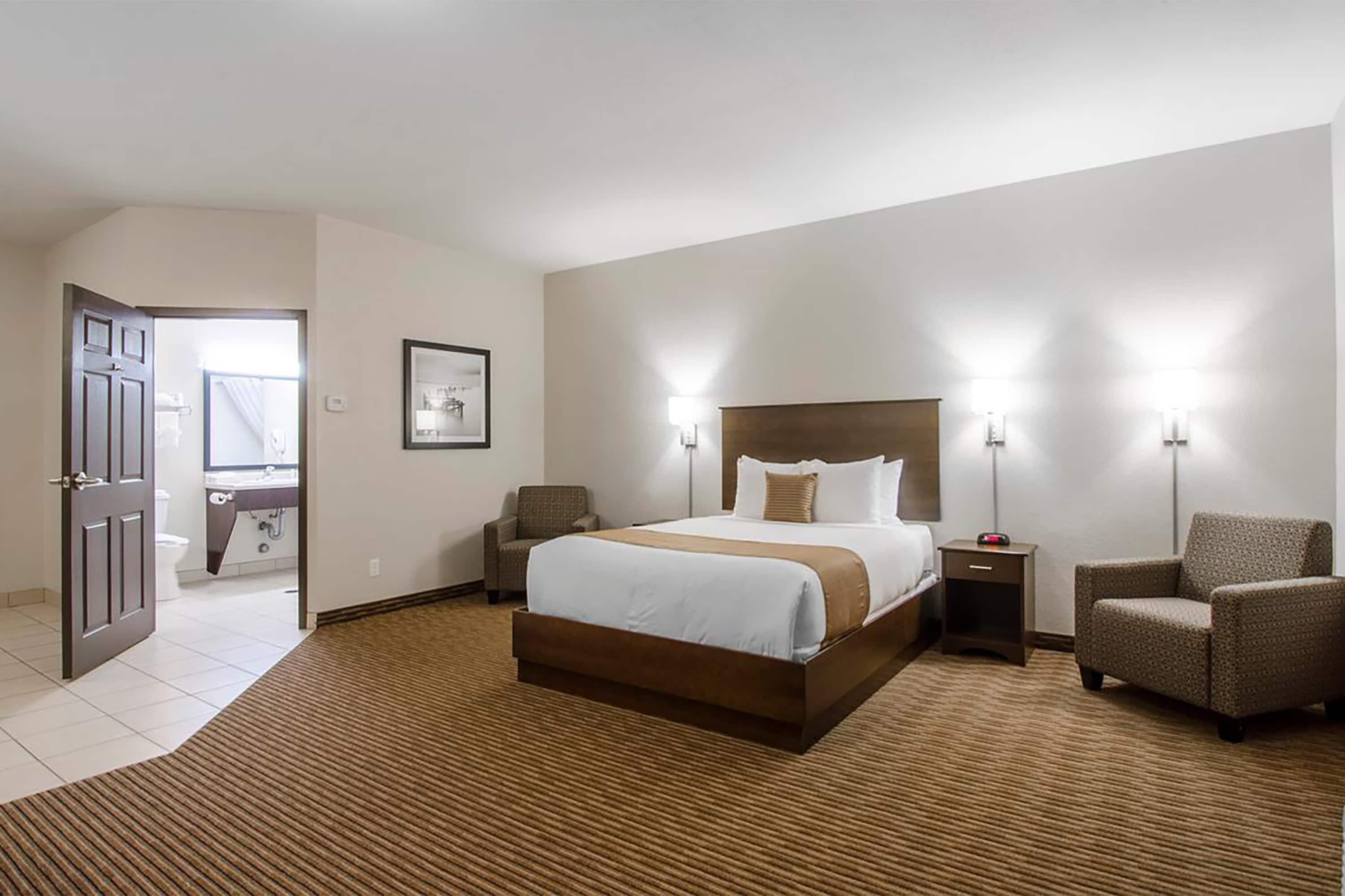 Quarto, 1 cama king-size, não fumadores | Secretária, cortinas/cortinados opacos, ferro/tábua de engomar 