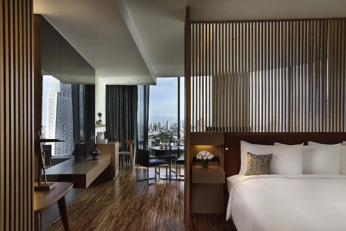 Estúdio com design assinado, 1 cama King, acesso ao Club Lounge (So) | Roupas de cama premium, frigobar (abastecido com itens grátis)