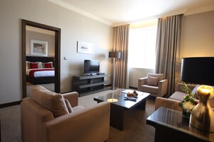 Suite Premium, 1 cama king-size | Sala | TV de ecrã plano 