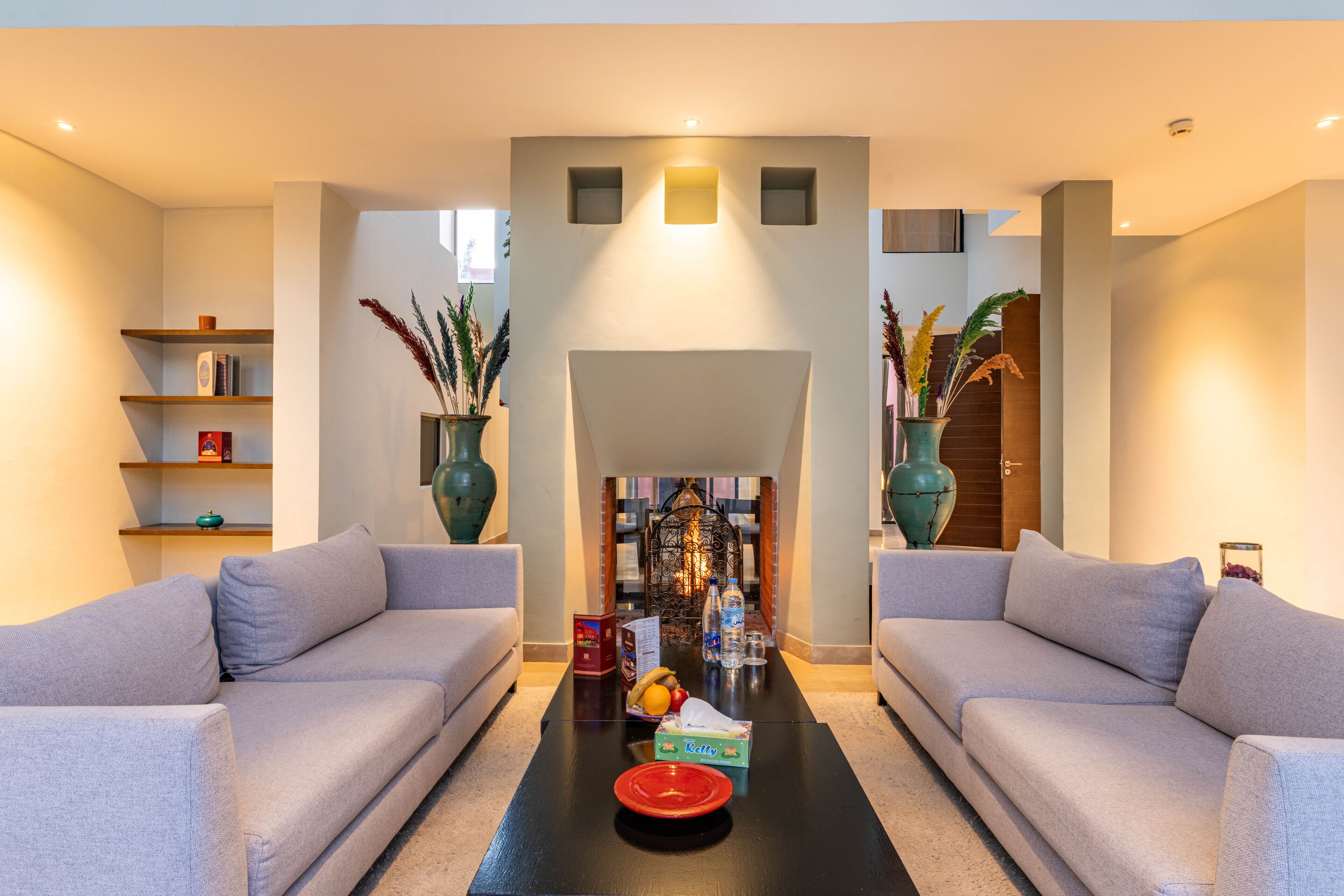 Villa Deluxe, 4 quartos | Sala de estar | Televisor LCD de 40 polegadas com canais via satélite, lareira 