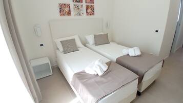 Quarto Standard, 2 camas individuais | Cofre no quarto, ferro/tábua de engomar, Wi-fi grátis