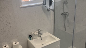 Apartamento, suíte, vista para o mar | Banheiro