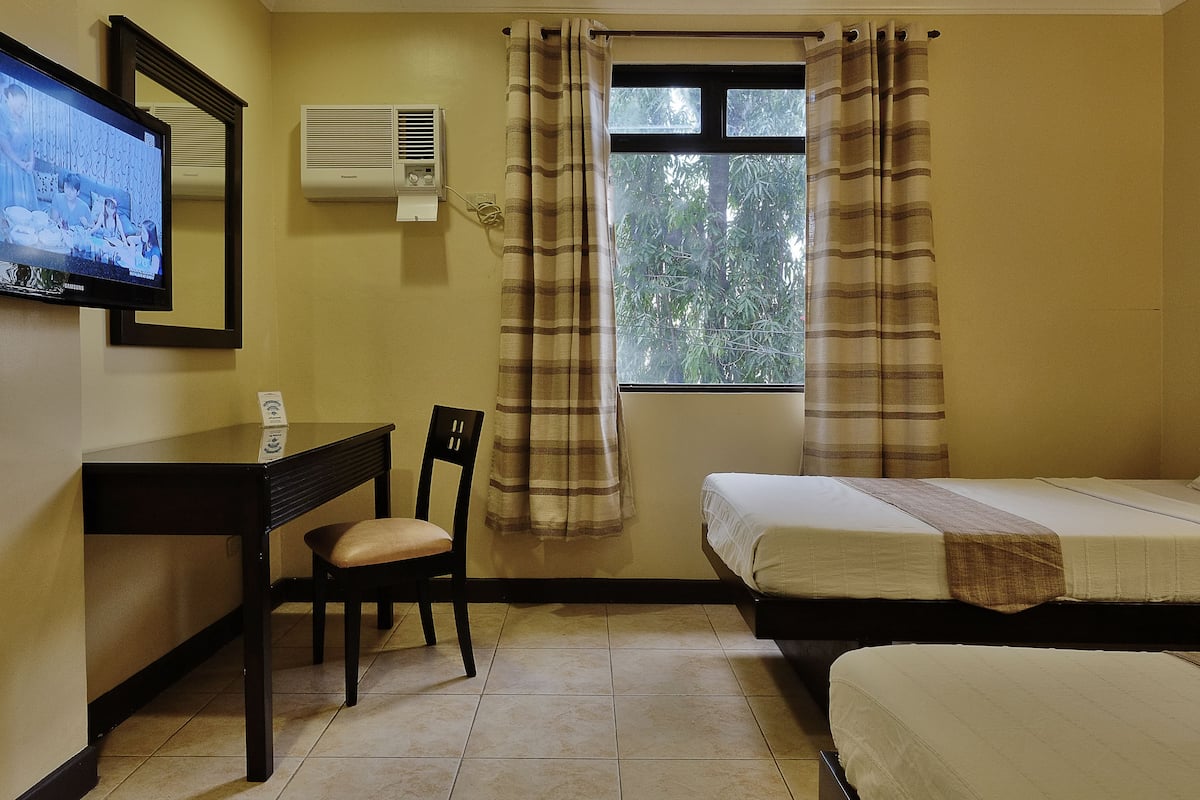 Quarto superior, 2 camas de solteiro | Roupas de cama premium, cofres nos quartos, individualmente mobiliados