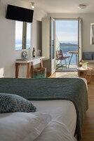 Quarto standard, vista para o mar | Roupas de cama premium, frigobar, cofres nos quartos, cortinas blackout