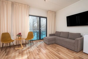 Suite Deluxe, sauna | Ferro/tábua de engomar, Wi-fi grátis, roupa de cama fornecida 