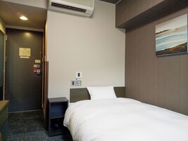 Quarto solteiro, para fumantes (Only E-cigarettes Allowed) | Wi-Fi de cortesia, roupa de cama