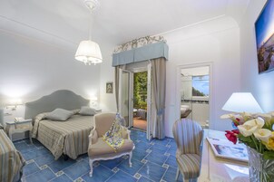 Suite-Estúdio Júnior, 1 quarto, vista para o mar | Minibar, cofre no quarto, com decoração personalizada, secretária 