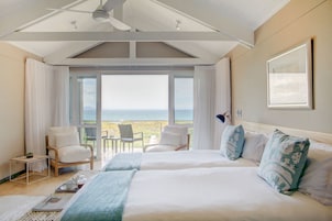 Quarto casal superior, 1 cama King, sacada, vista para o oceano | Vista do quarto