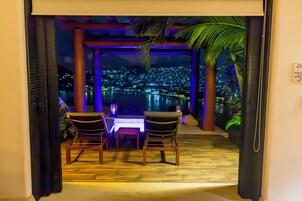 Suíte júnior, 1 cama King, terraço, vista para o oceano | 1 quarto, roupas de cama premium, edredons de pluma