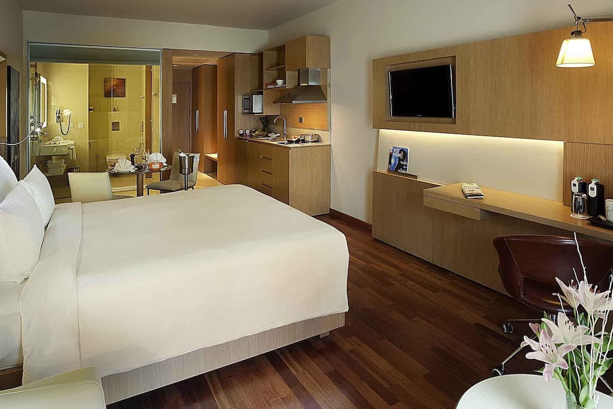 Quarto premier, 1 cama Queen, vista para o oceano | 1 quarto, roupas de cama premium, edredons de pluma, frigobar