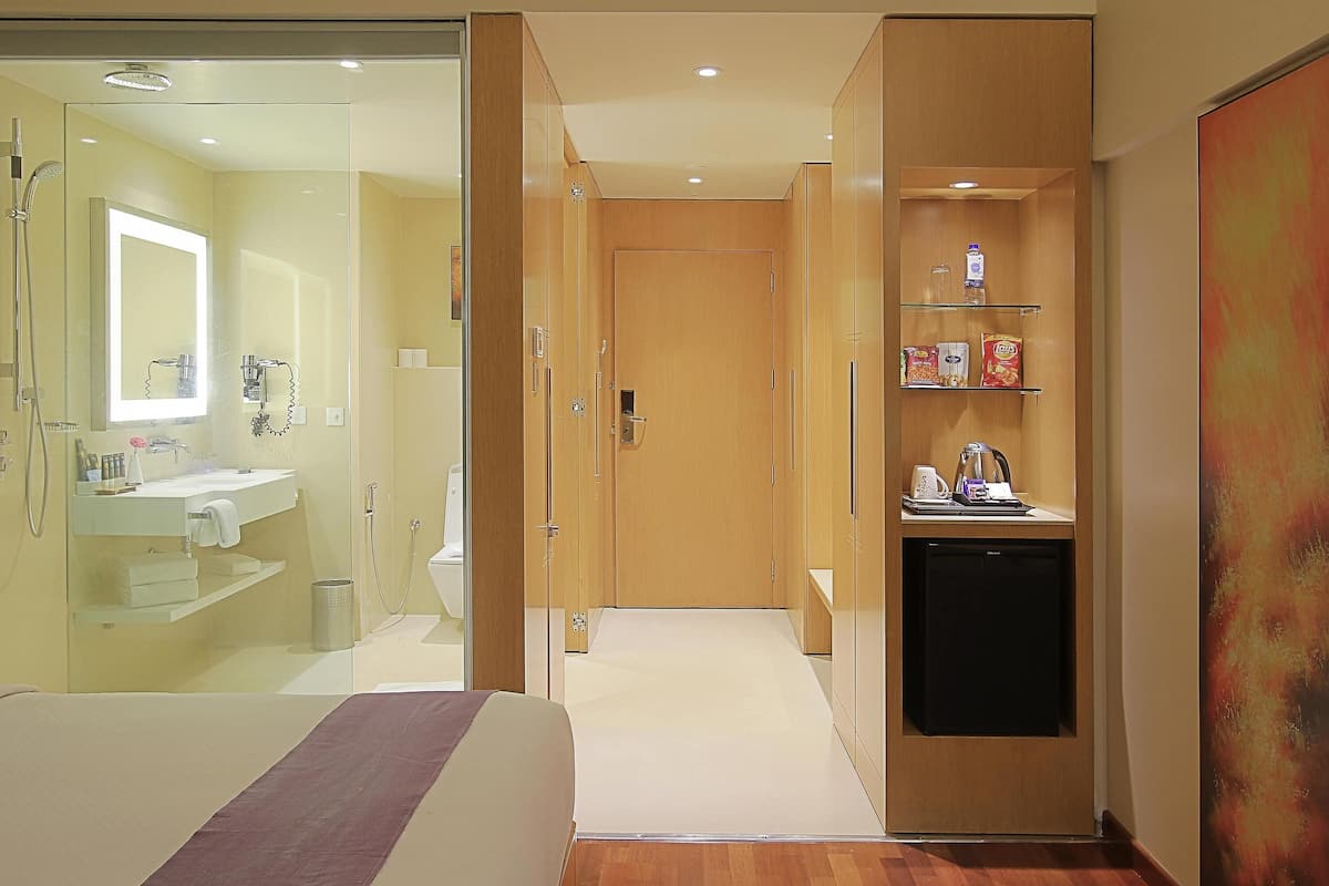 1 quarto, roupas de cama premium, edredons de pluma, frigobar