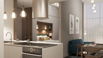 Apartamento superluxo, 1 cama King e sofá-cama, para não fumantes, vista para a cidade | Cozinha privada | Refrigerador em uma área comum, micro-ondas em uma área comum