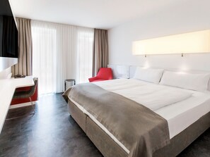 Quarto casal ou duplo | Frigobar (abastecido com itens grátis), cofres nos quartos, escrivaninha