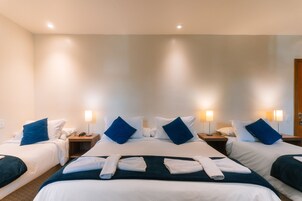 Apartamento Família (4 pessoas) Luxo | Roupas de cama antialérgicas, frigobar, cortinas blackout