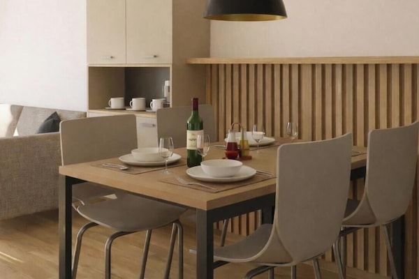 Apartamento Premium | Sala de estar | Televisor