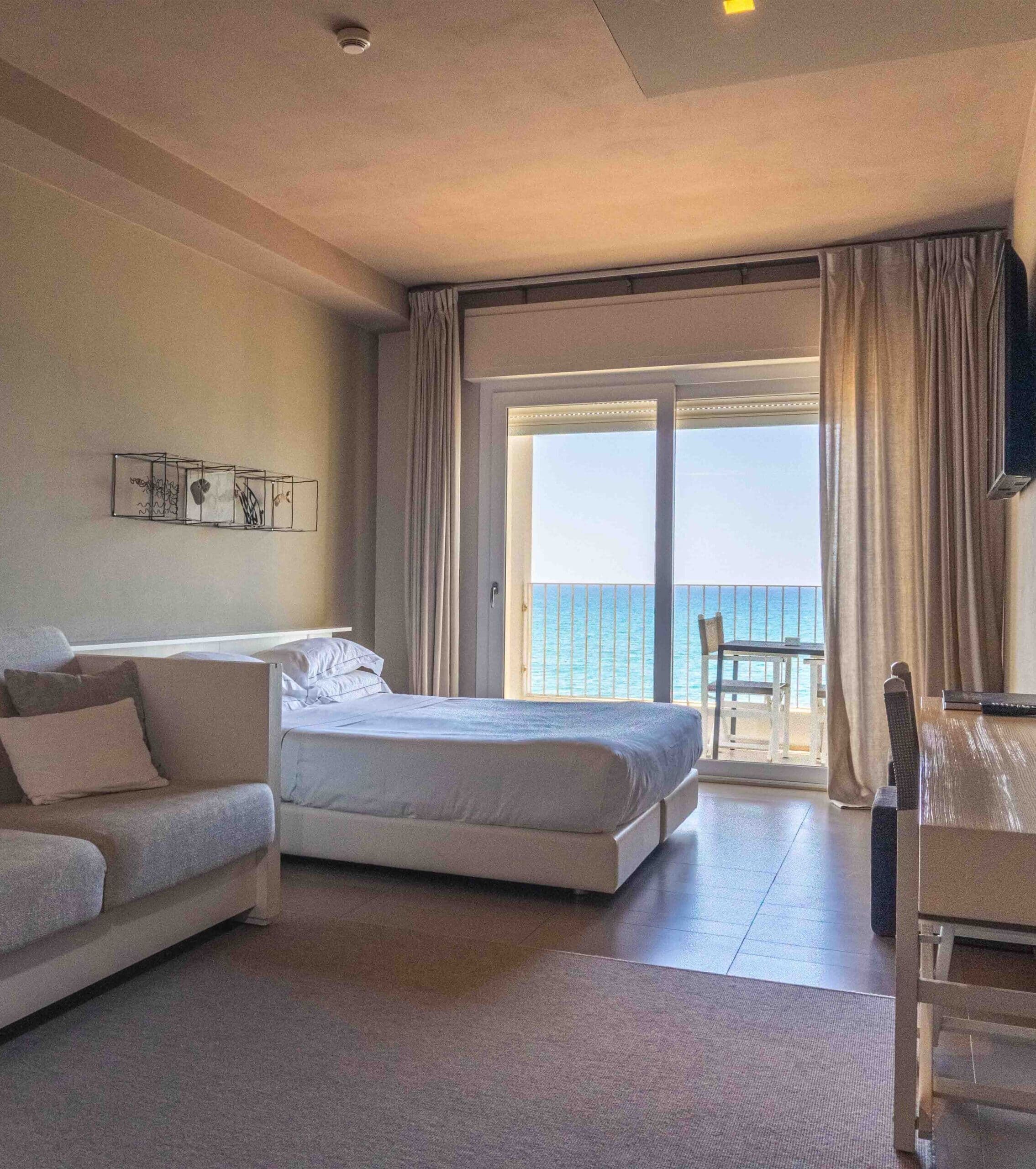 Quarto júnior, vista para a praia (suite) | 1 quarto, roupas de cama premium, camas Select Comfort, frigobar