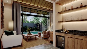 Uma cozinha moderna com área de refeições, forno embutido e uma grande janela com vista para um jardim.