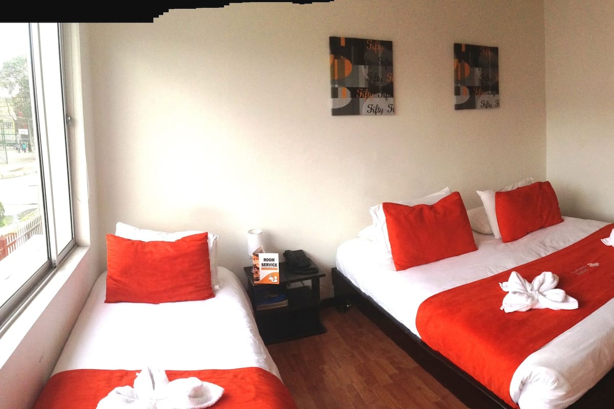 Quarto Quádruplo | Minibar, Wi-fi grátis