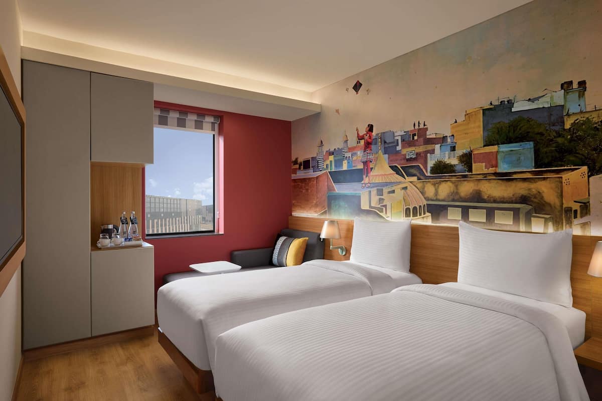 Camas com colchões de espuma com sistema de memória, frigobar