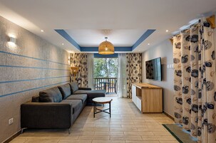 Quarto família | Área de estar | TV de tela plana 32 polegadas com canais a cabo, TV