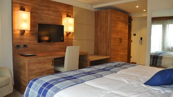 1 quarto, roupa de alta qualidade, camas de colchão pillowtop, minibar