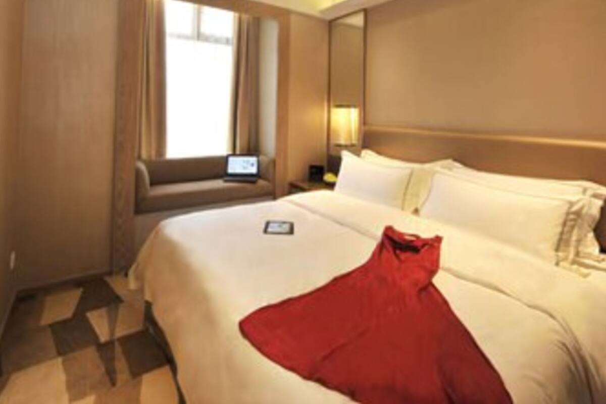 Suite Deluxe | Roupa de alta qualidade, edredões de penas, minibar, cofre no quarto