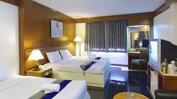 Quarto Deluxe | Minibar, cofre no quarto, cortinas/cortinados opacos