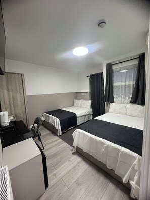 Quarto triplo superior | Roupas de cama premium