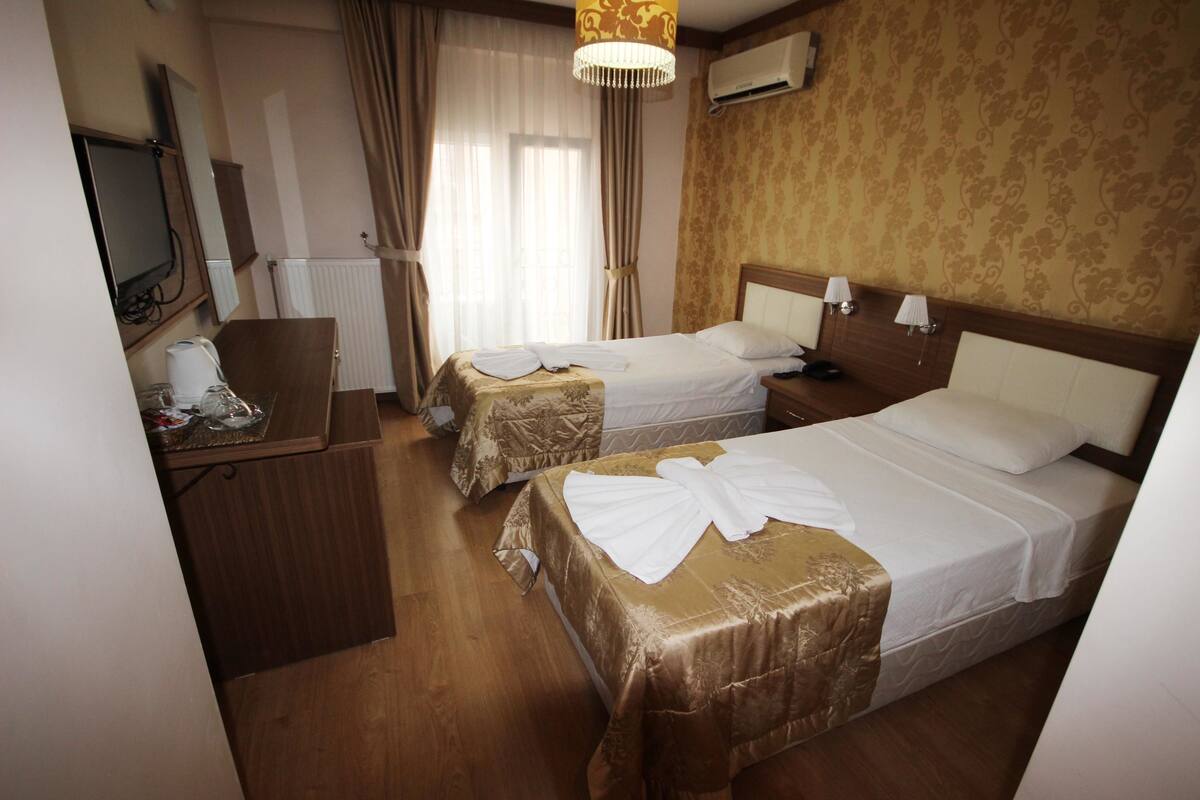 Double or Twin Room | Roupa de alta qualidade, minibar, cofre no quarto 