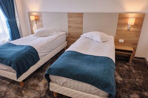 Quarto Twin Standard | Minibar, quartos insonorizados, Wi-fi grátis 
