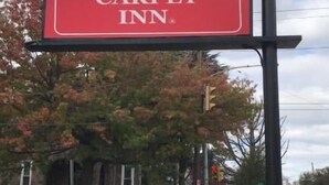 Placa para Red Carpet Inn.