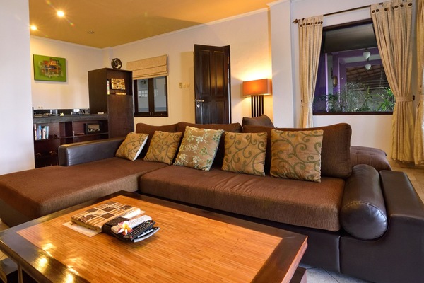 Apartamento Superior, vista para o mar | Sala | Televisor LCD, leitor de DVD