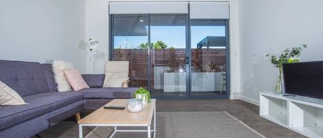 Apartamento (1 Bedroom) | Sala | Televisor