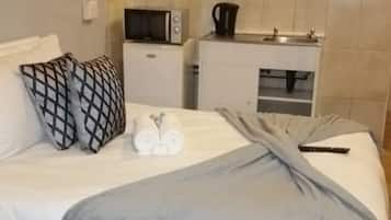 1 quarto, secretária, secretária adequada para computadores portáteis
