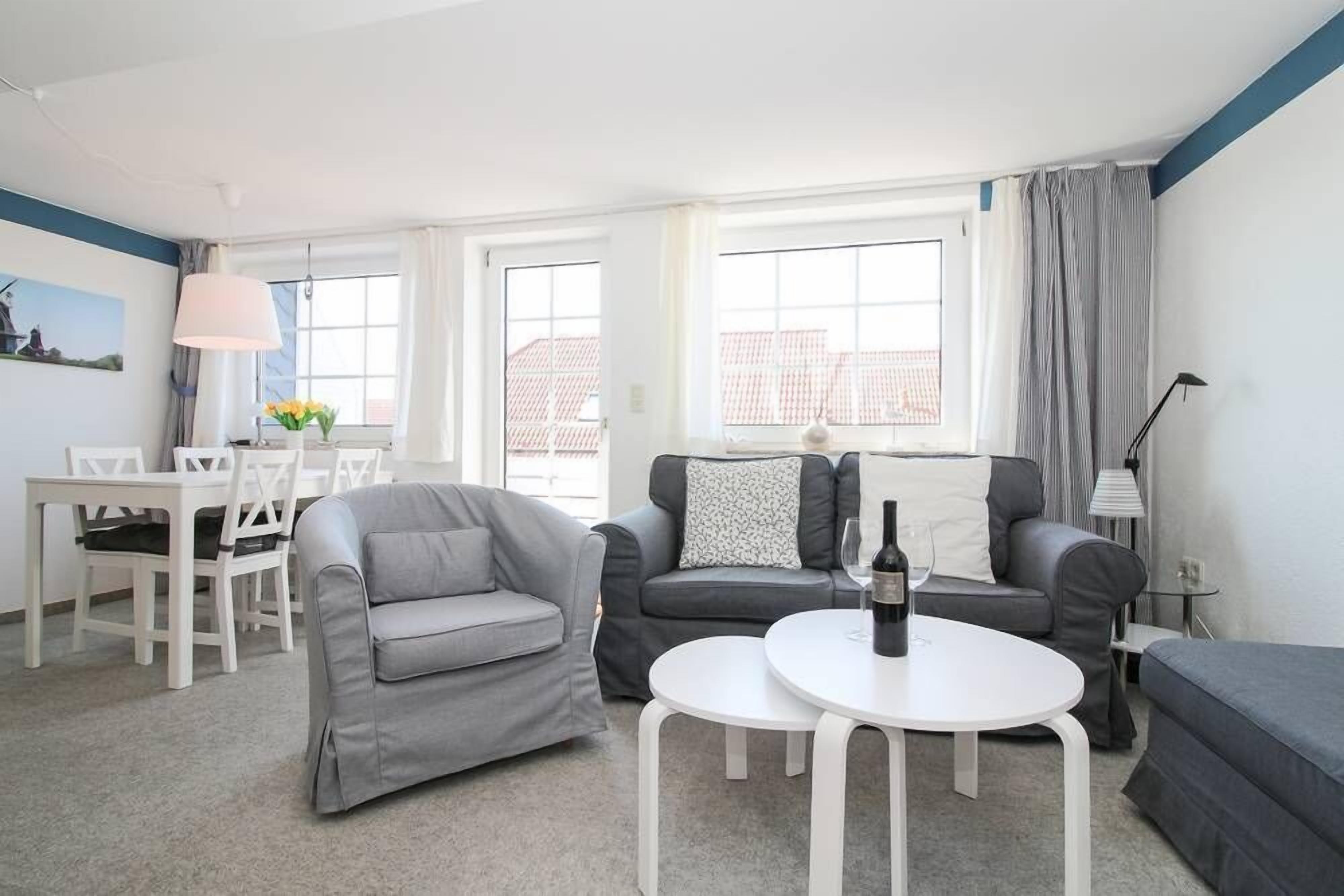 Apartamento, 2 quartos, terraço | Sala de estar | TV de tela plana