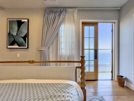 Suíte, 1 cama Queen, vista para o oceano | Vista do quarto