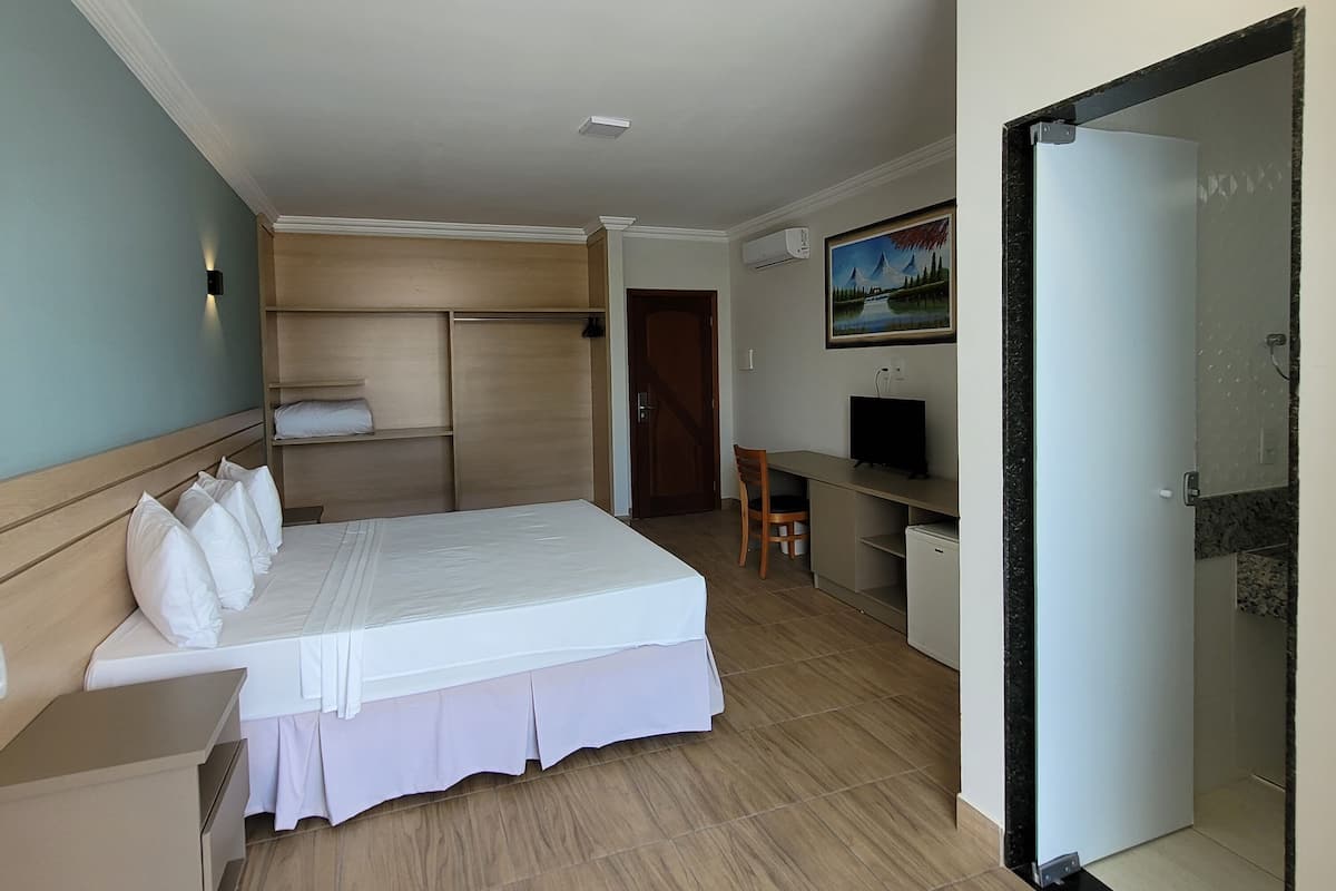 Suite Deluxe | Roupas de cama premium, frigobar, cofres nos quartos