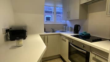 Apartamento premium | Cozinha privada | Geladeira, micro-ondas, fogão, cooktop