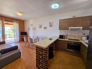 Casa, 1 quarto, para fumantes, terraço | Parte interna