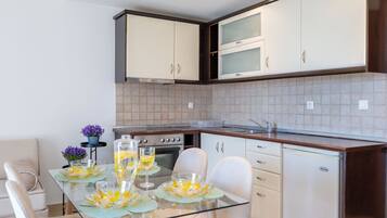 Apartamento, 1 quarto, vista para o jardim | Sala de jantar
