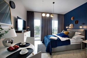 Estúdio empresarial | Área de estar | TV de tela plana