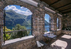 Apartamento família, vários quartos, 2 banheiros (Magic Gandria) | Terraço/pátio