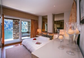 Apartamento família, vários quartos, 2 banheiros (Magic Gandria) | 2 quartos, ferros/tábuas de passar roupa, roupa de cama