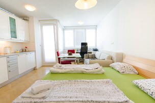 Apartamento | Área de estar | TV de tela plana