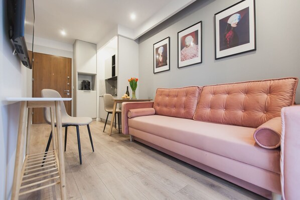 Apartamento Design | Sala | Televisor de ecrã plano de 40 polegadas com canais por cabo, televisor