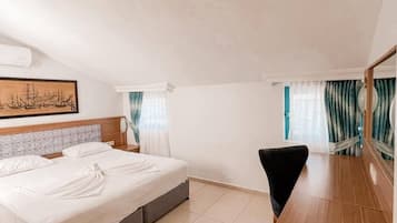 Suite | Minibar, secretária, quartos insonorizados, roupa de cama fornecida