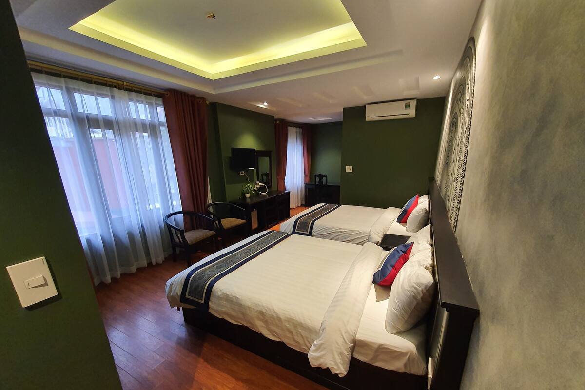 Quarto quádruplo luxo | Wi-Fi de cortesia, roupa de cama
