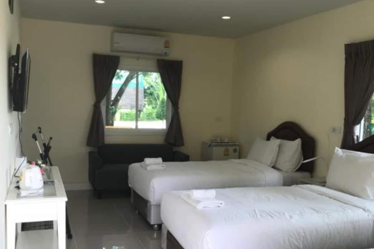 Bigger Cottage with Garden View | 1 quarto, espaço de trabalho para notebook, Wi-Fi de cortesia